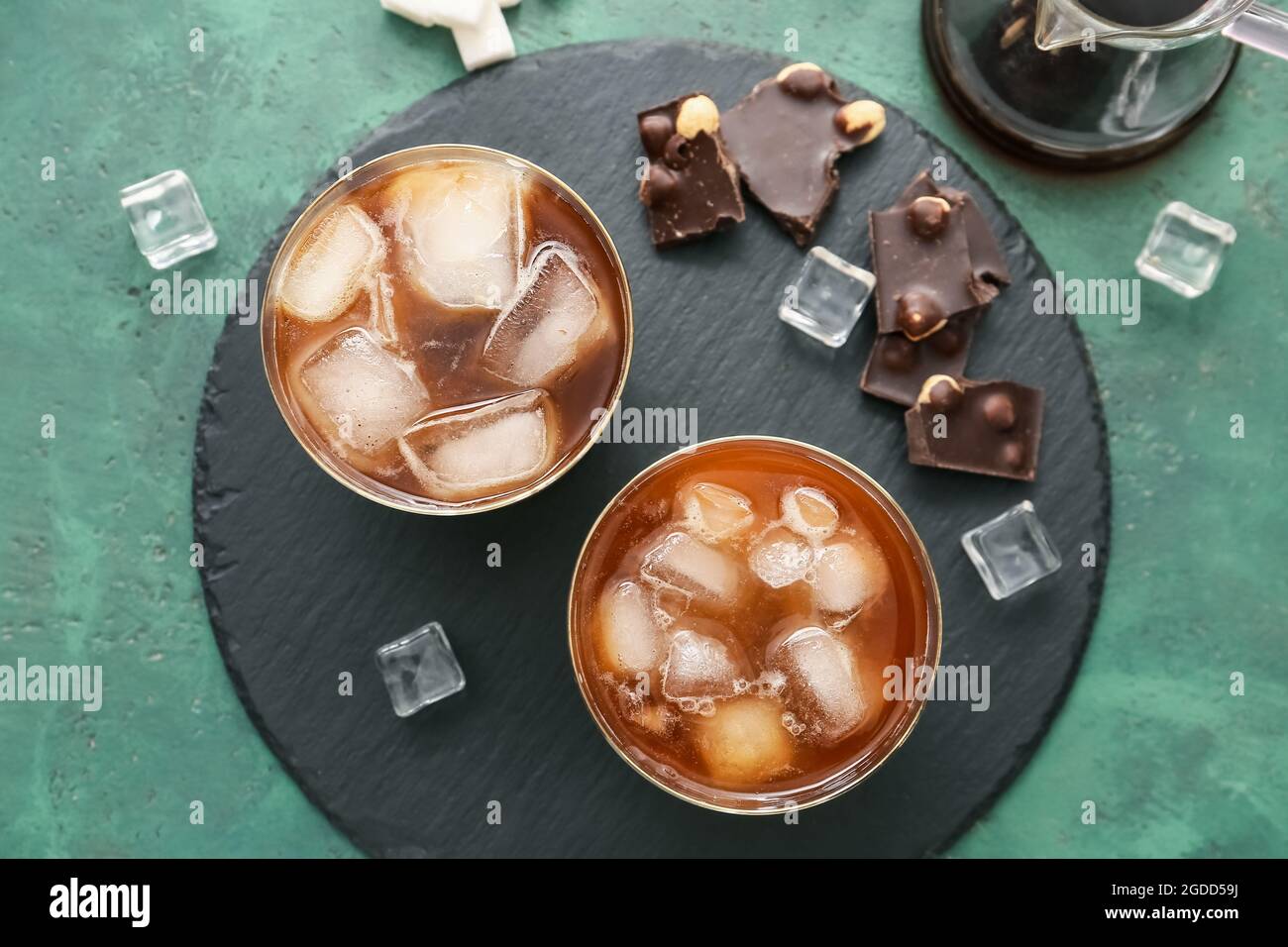 Composition with glasses of tasty iced coffee on color background Stock ...