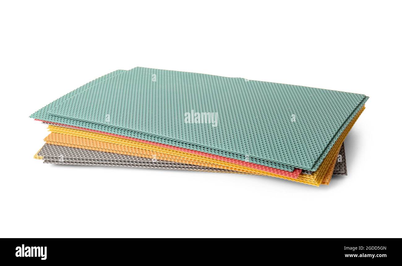 Stack of wax sheets on white background Stock Photo - Alamy