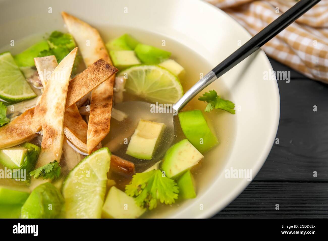 Plate of tasty Sopa de Lima soup on table, closeup Stock Photo - Alamy