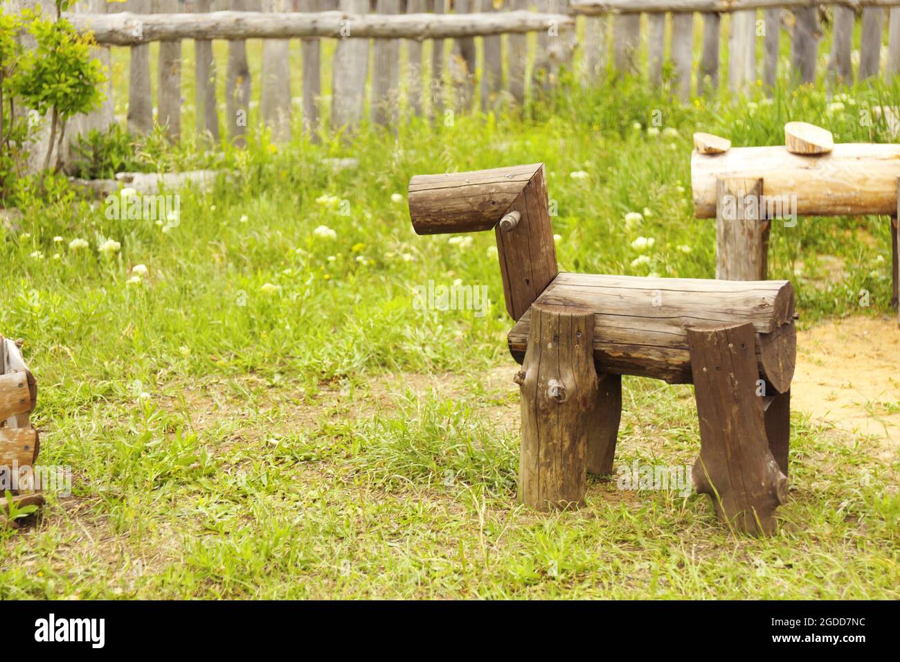 Decorative wooden figure for garden design, outdoors Stock Photo - Alamy