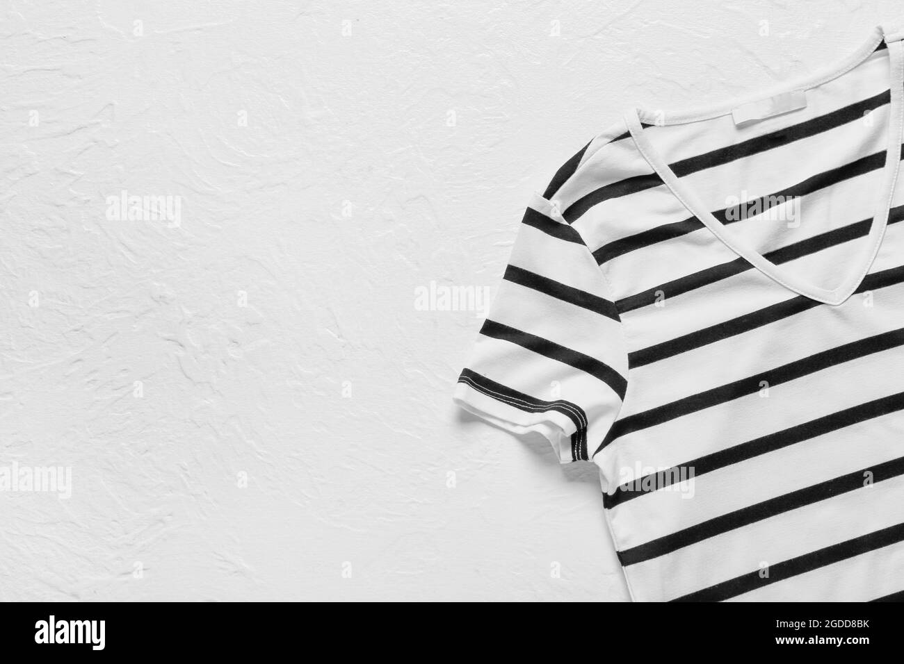 Stylish t-shirt on light background Stock Photo - Alamy