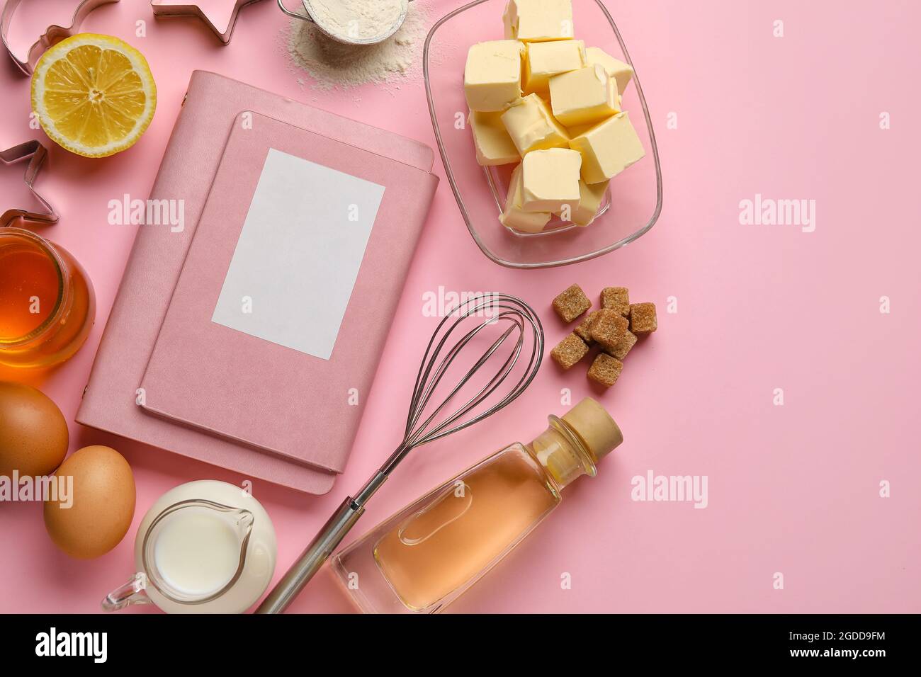 Recipe book with products on color background Stock Photo - Alamy