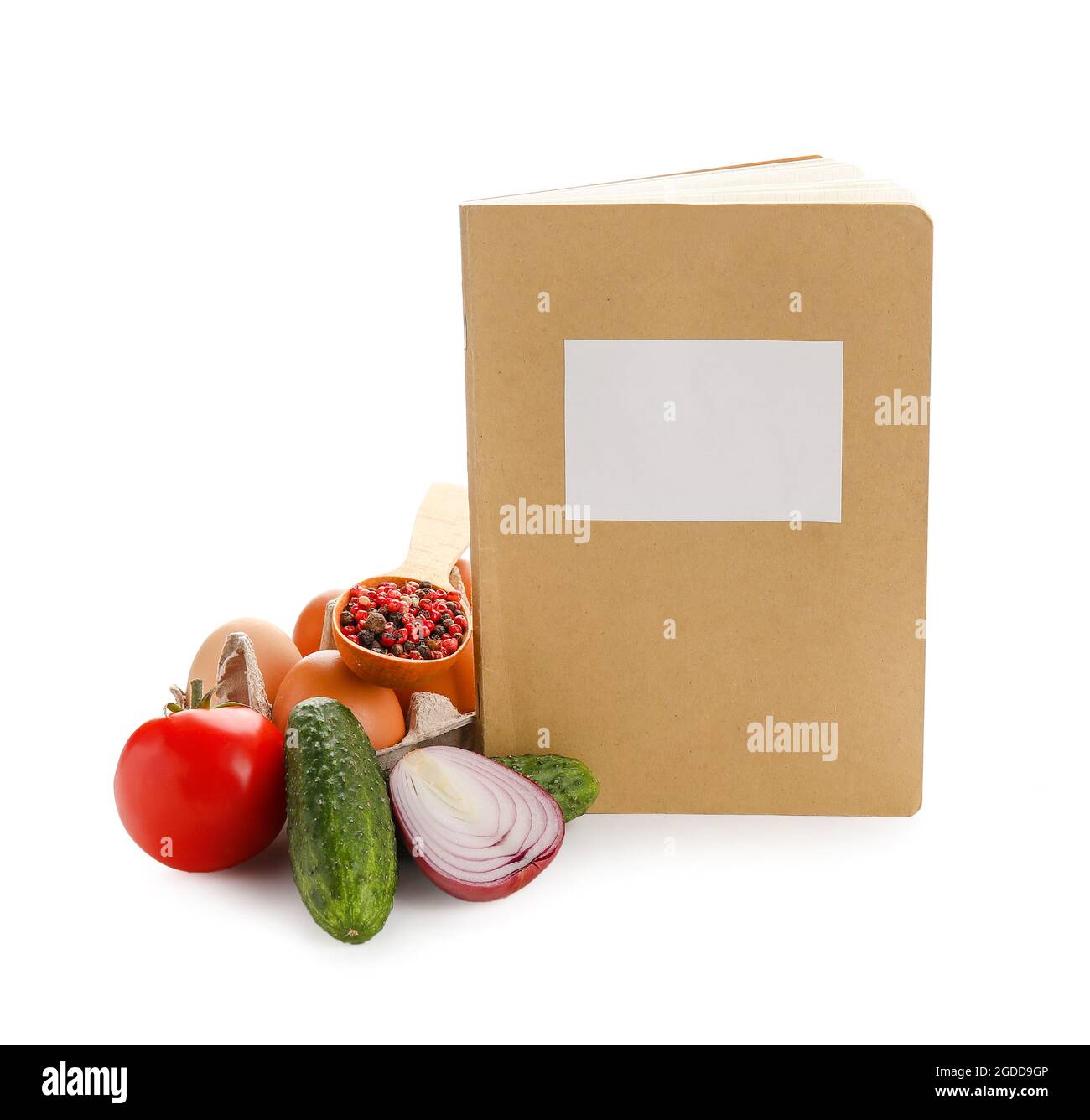 Recipe book with products on white background Stock Photo - Alamy