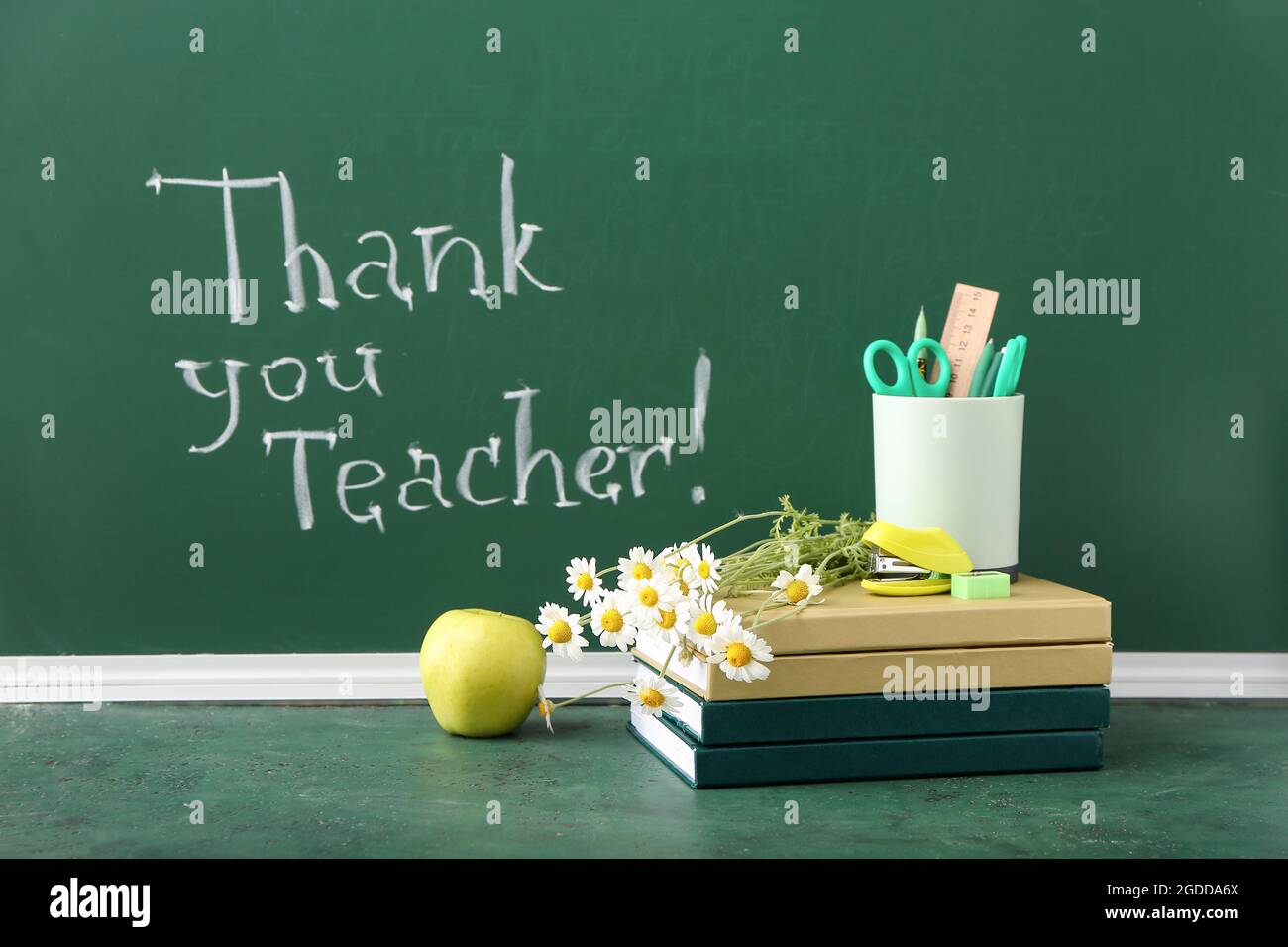 Books with flowers, apple, stationery and text THANK YOU TEACHER on ...