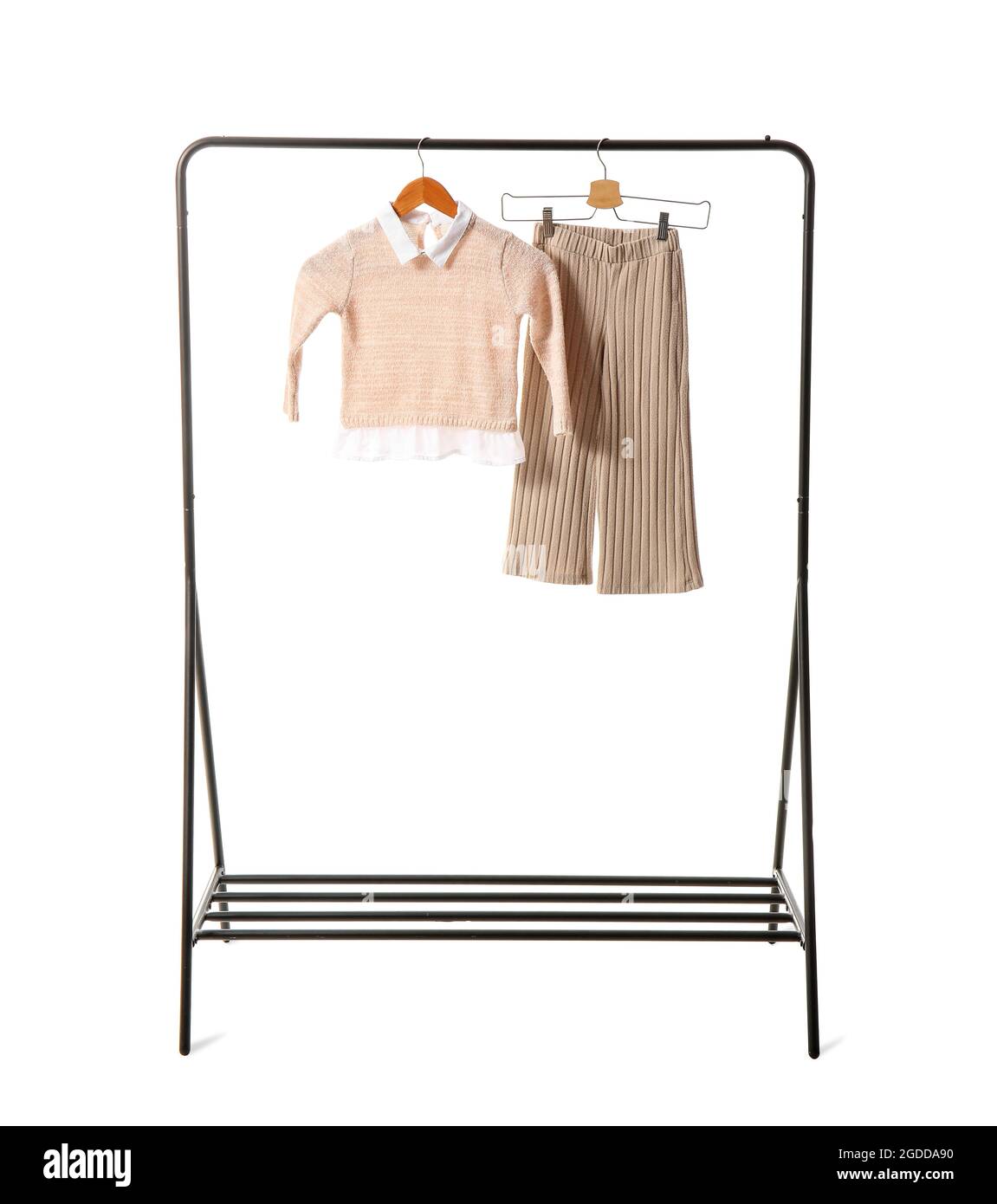 Rack with stylish school uniform on white background Stock Photo - Alamy