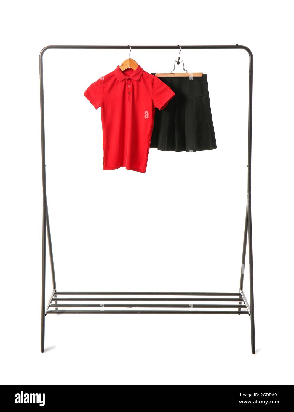 Rack with stylish school uniform on white background Stock Photo - Alamy
