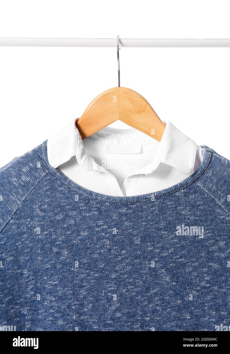 Rack with stylish school uniform on white background Stock Photo - Alamy