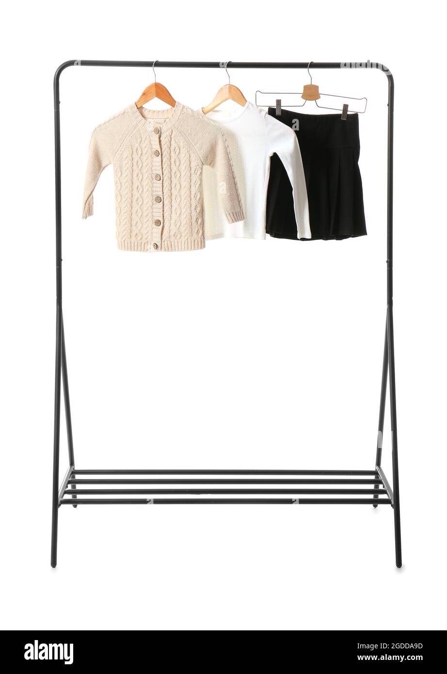 Rack with stylish school uniform on white background Stock Photo - Alamy