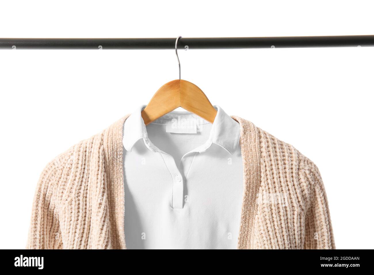 Rack with stylish school uniform on white background Stock Photo - Alamy