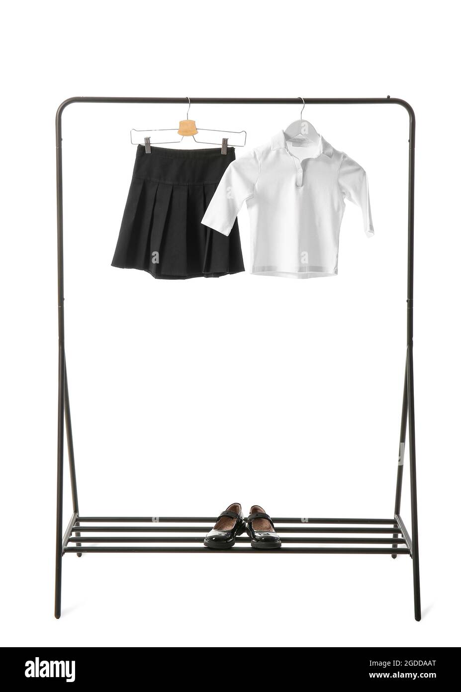Rack with stylish school uniform on white background Stock Photo - Alamy