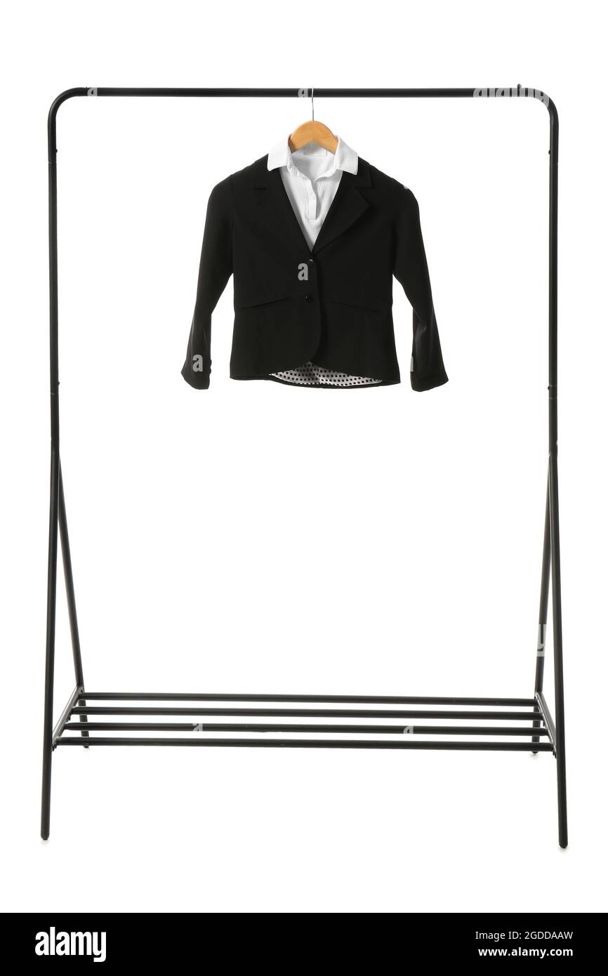 Rack with stylish school uniform on white background Stock Photo - Alamy