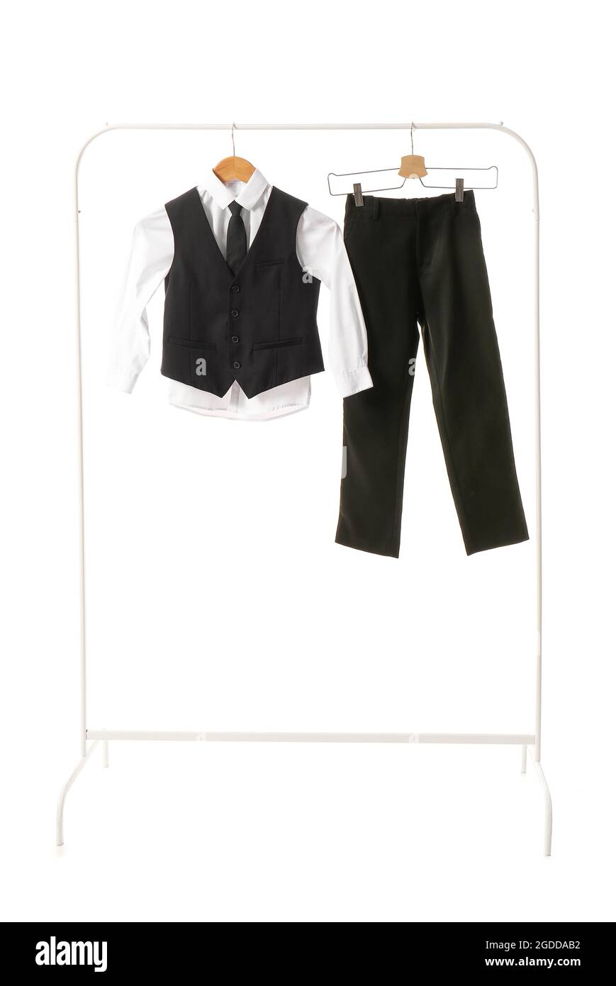 Rack with stylish school uniform on white background Stock Photo - Alamy