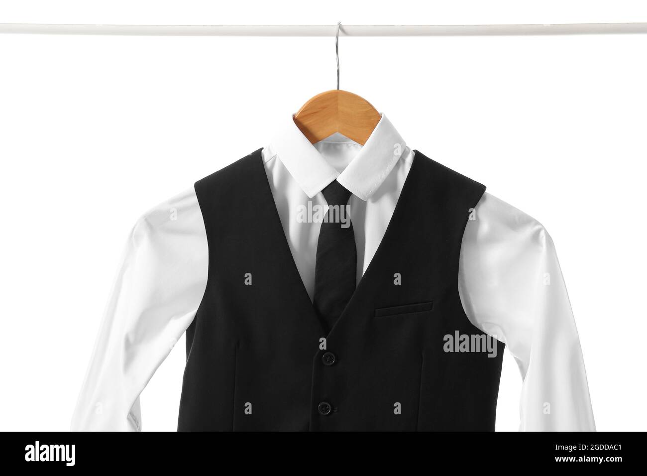 Rack with stylish school uniform on white background Stock Photo - Alamy
