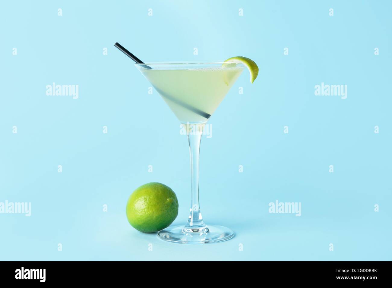 Glass with tasty daiquiri cocktail on color background Stock Photo - Alamy