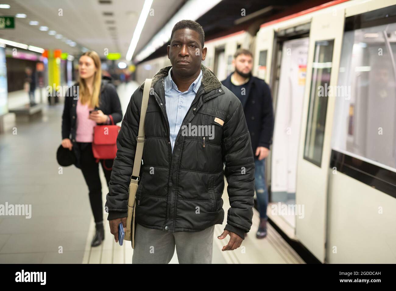 African American waiting for subway train Stock Photo - Alamy