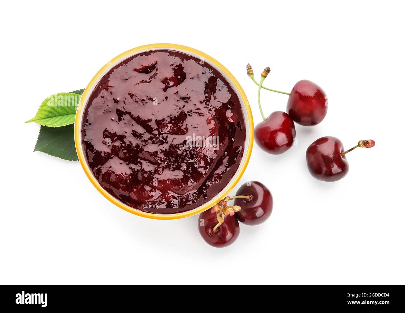 Bowl of tasty cherry jam on white background Stock Photo - Alamy