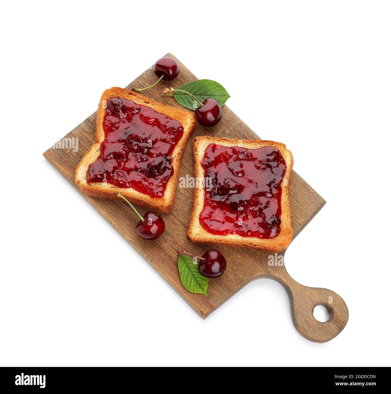 Toasts with tasty cherry jam on white background Stock Photo - Alamy