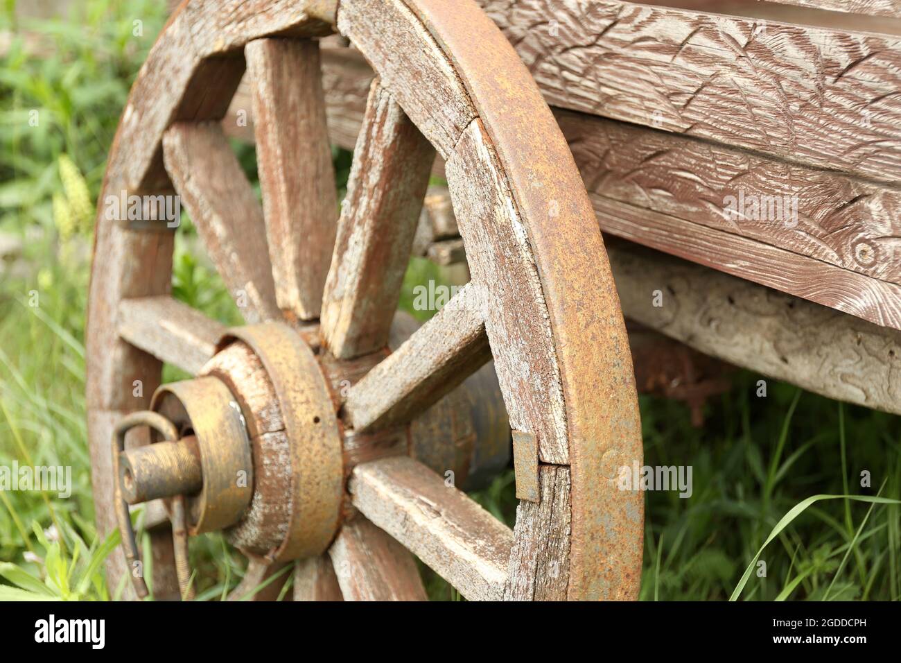Old retro wheel on trolley, outdoors Stock Photo - Alamy