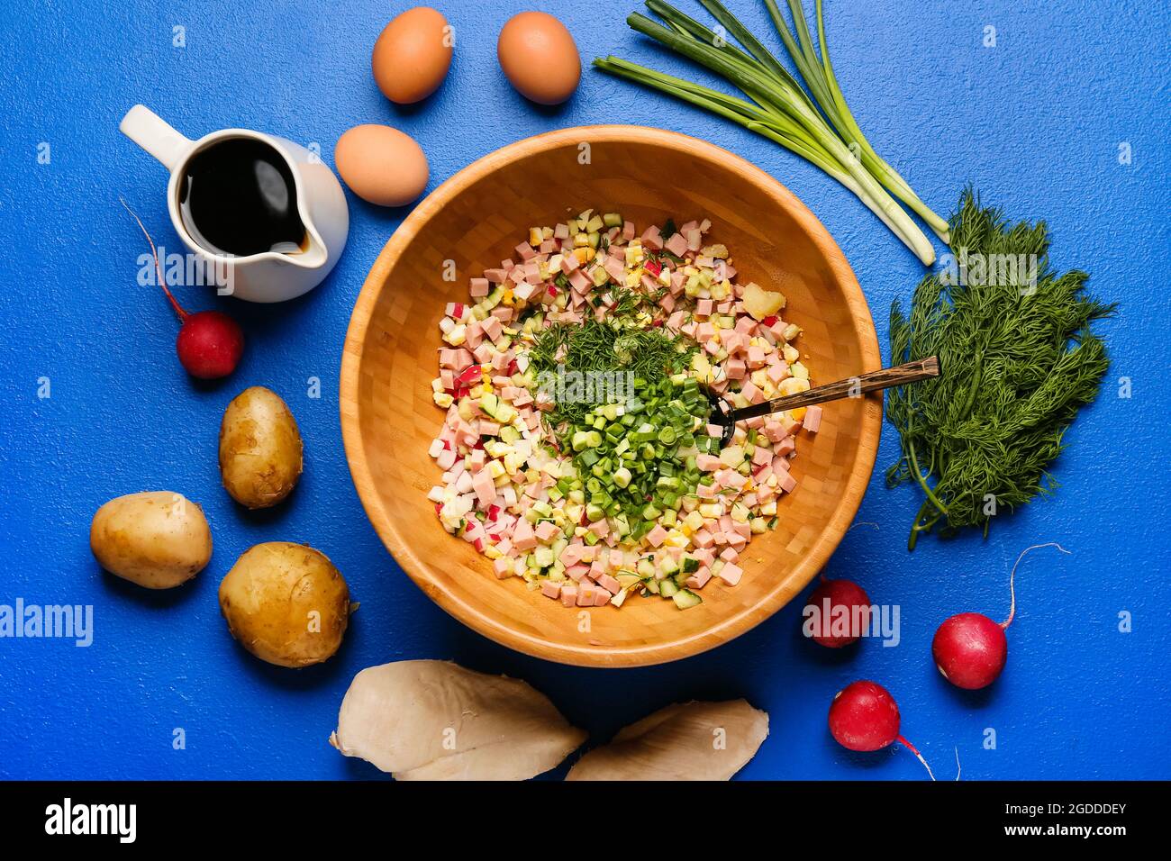 Composition with different ingredients for okroshka on color background ...