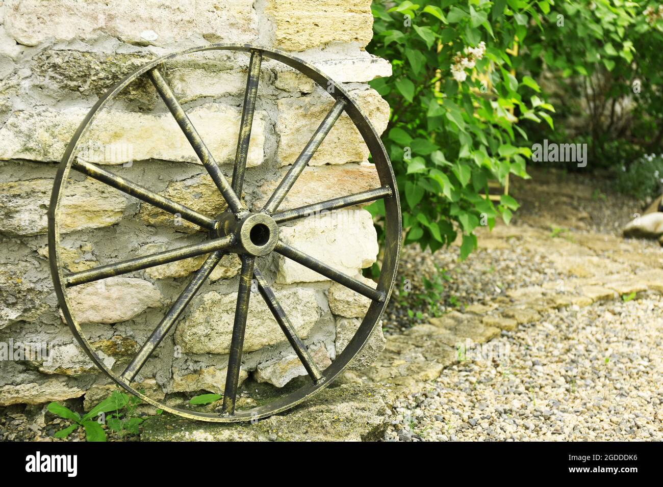 Old retro wheel, outdoors Stock Photo - Alamy