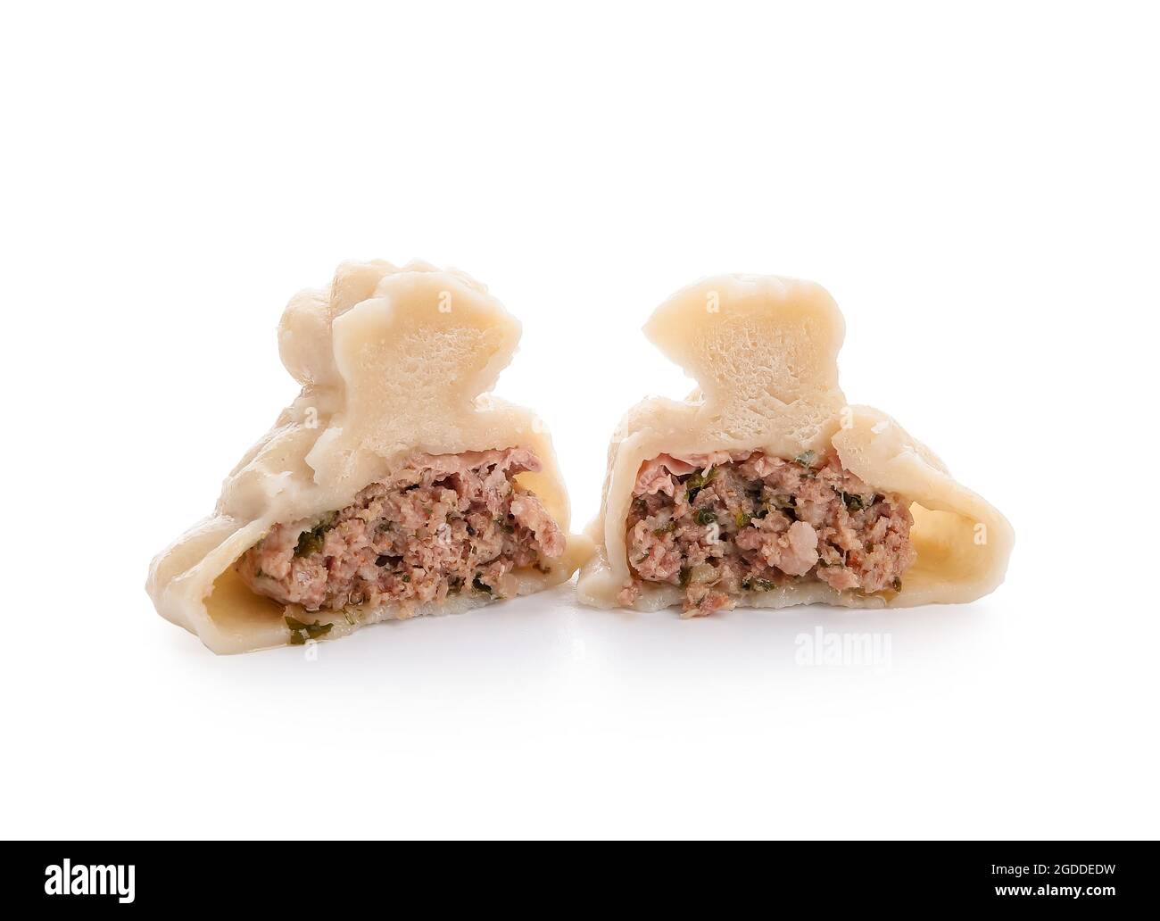 Cut tasty dumpling on white background Stock Photo - Alamy
