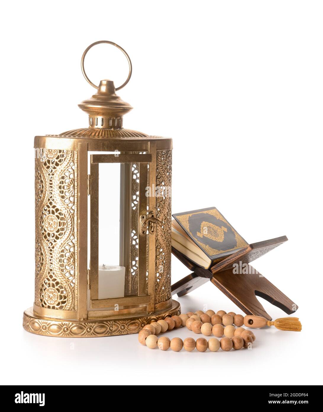 Muslim lantern with Quran and tasbih on white background Stock Photo ...