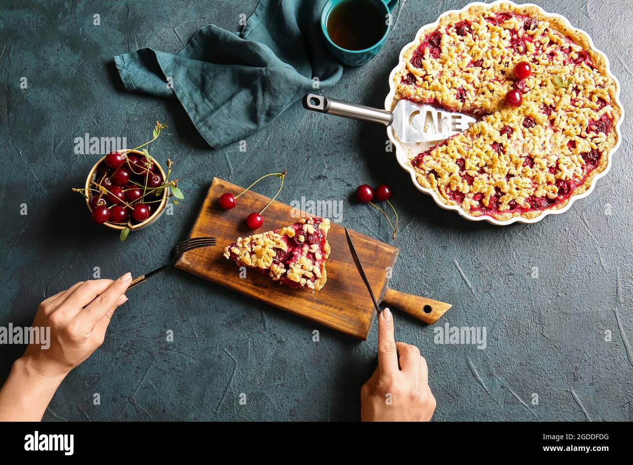 Woman eating cherry pie hi-res stock photography and images - Alamy