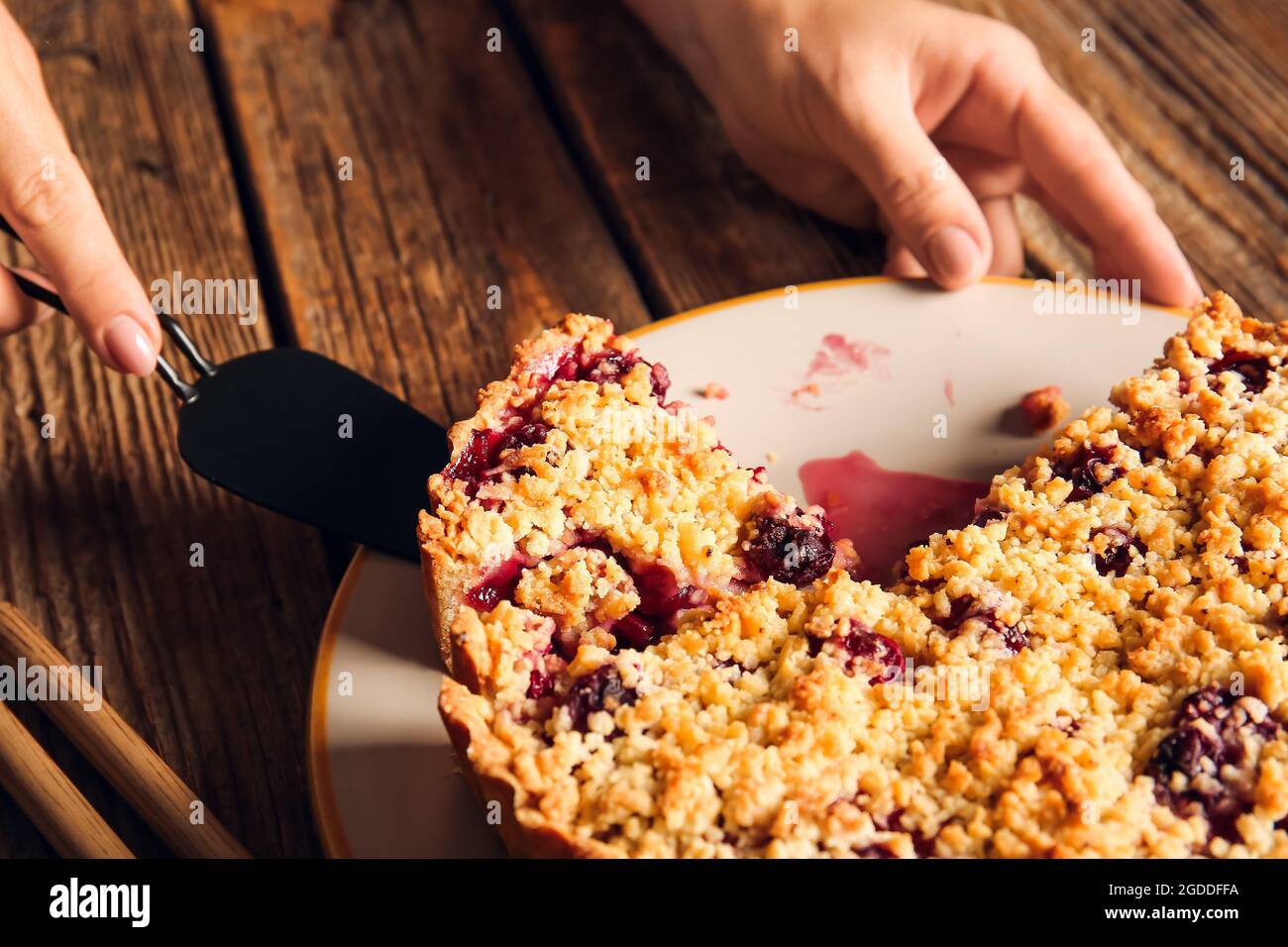 Woman taking piece cake from hi-res stock photography and images - Alamy