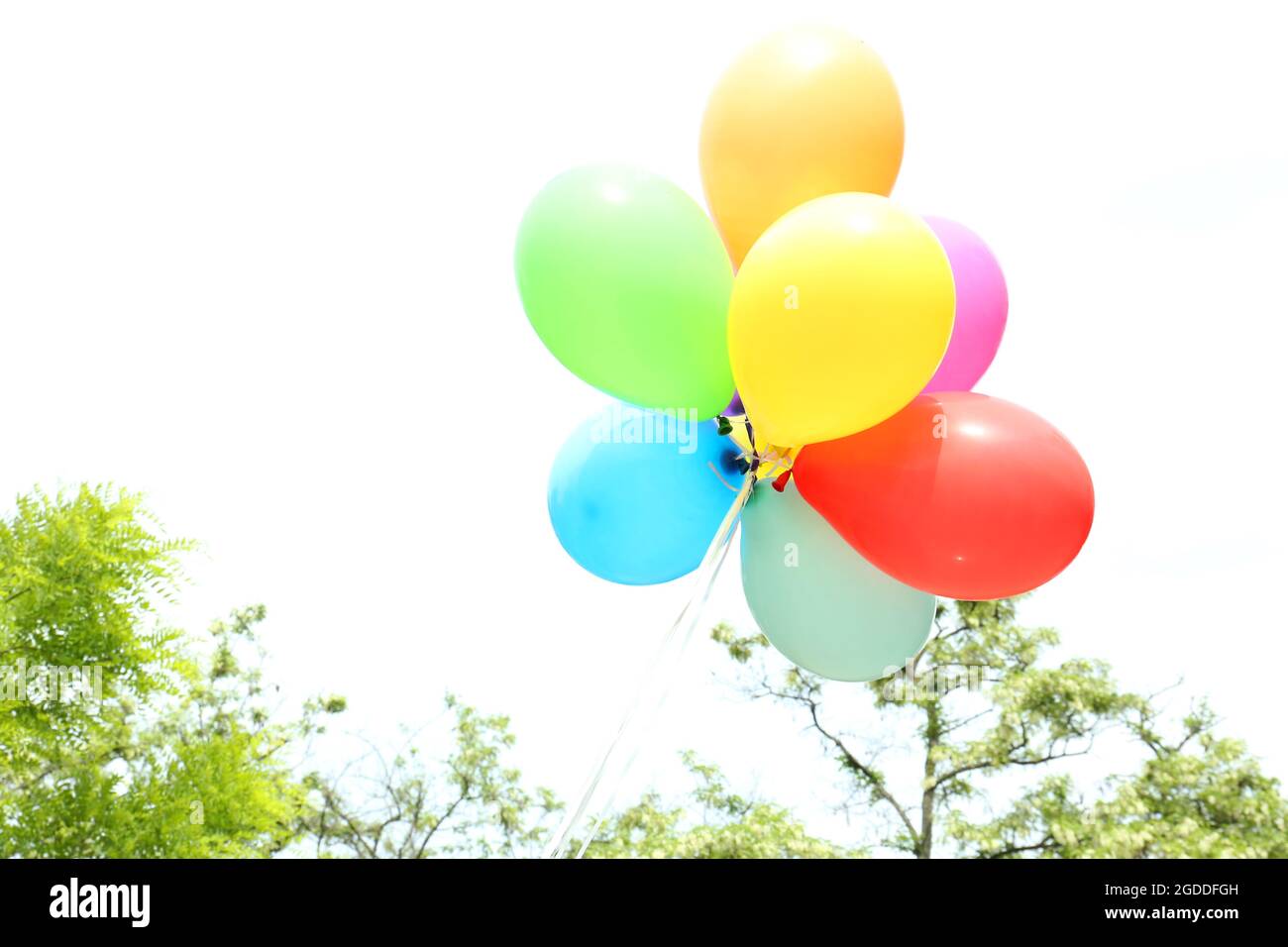 Balloons flying outdoors Stock Photo - Alamy