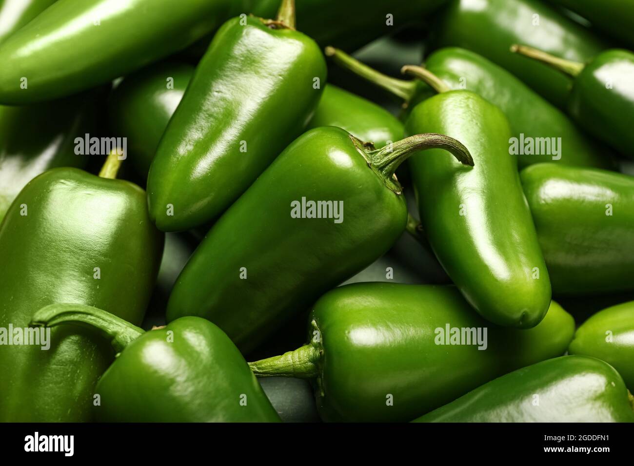 Green jalapeno peppers as background, closeup Stock Photo - Alamy