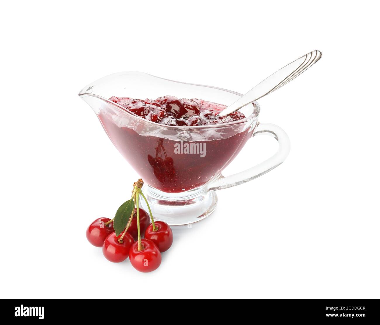 Gravy boat with tasty cherry jam on white background Stock Photo - Alamy