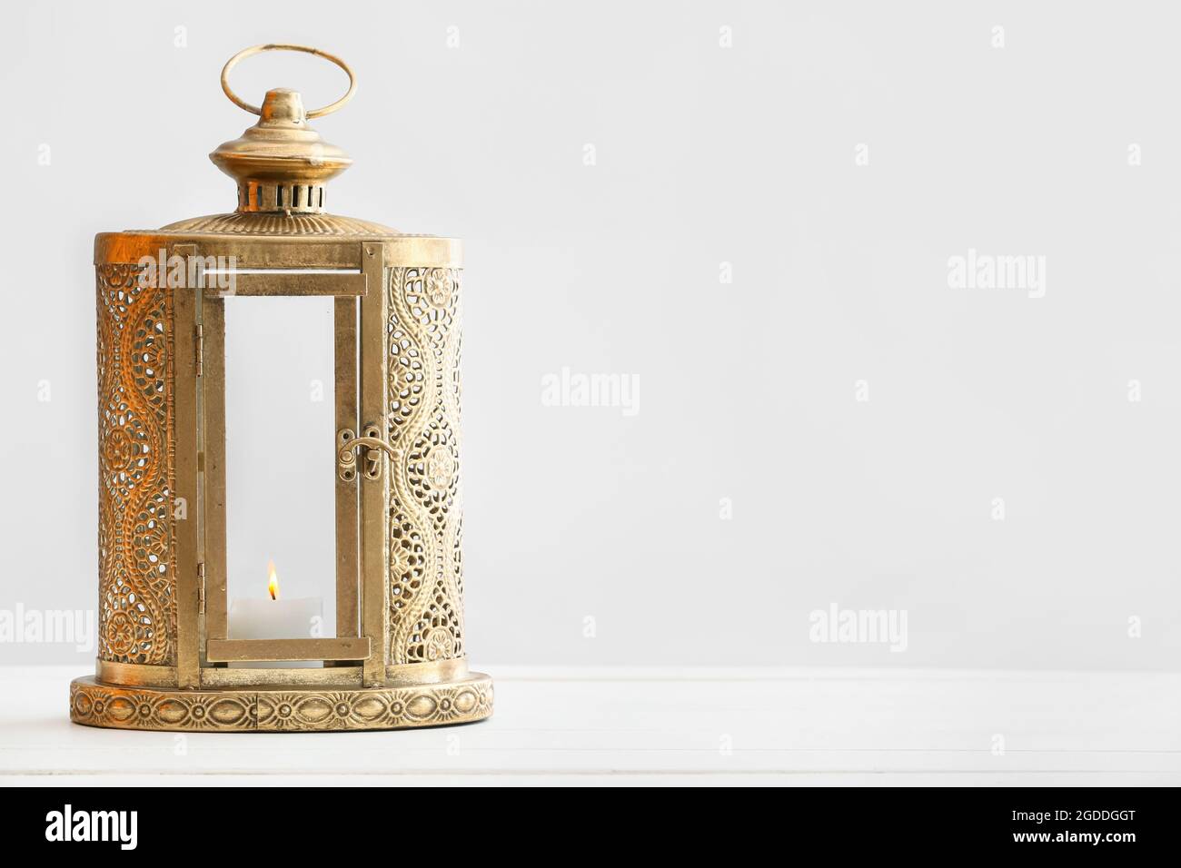 Muslim lantern on light background Stock Photo - Alamy