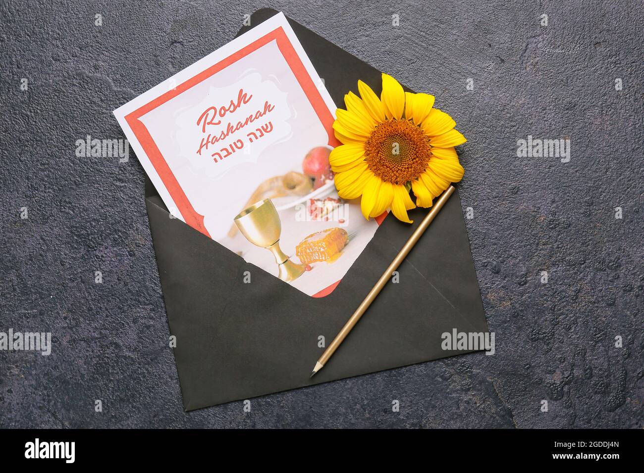 Greeting card for Rosh hashanah (Jewish New Year) with envelope on dark ...