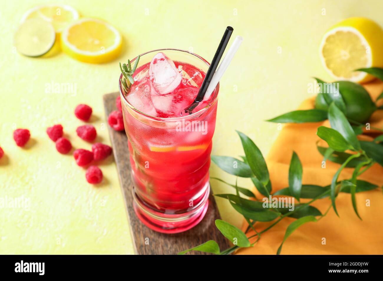 Glass of tasty raspberry lemonade on color background Stock Photo - Alamy