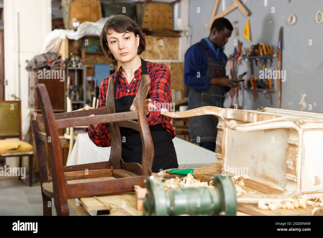 Inspecting antique hi-res stock photography and images - Alamy