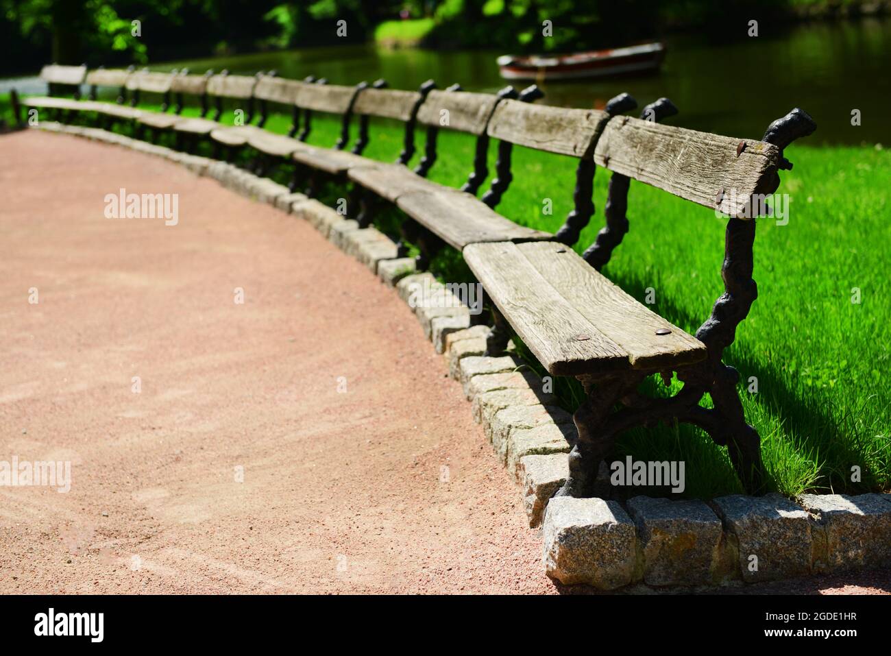Wooden benches at park Stock Photo - Alamy