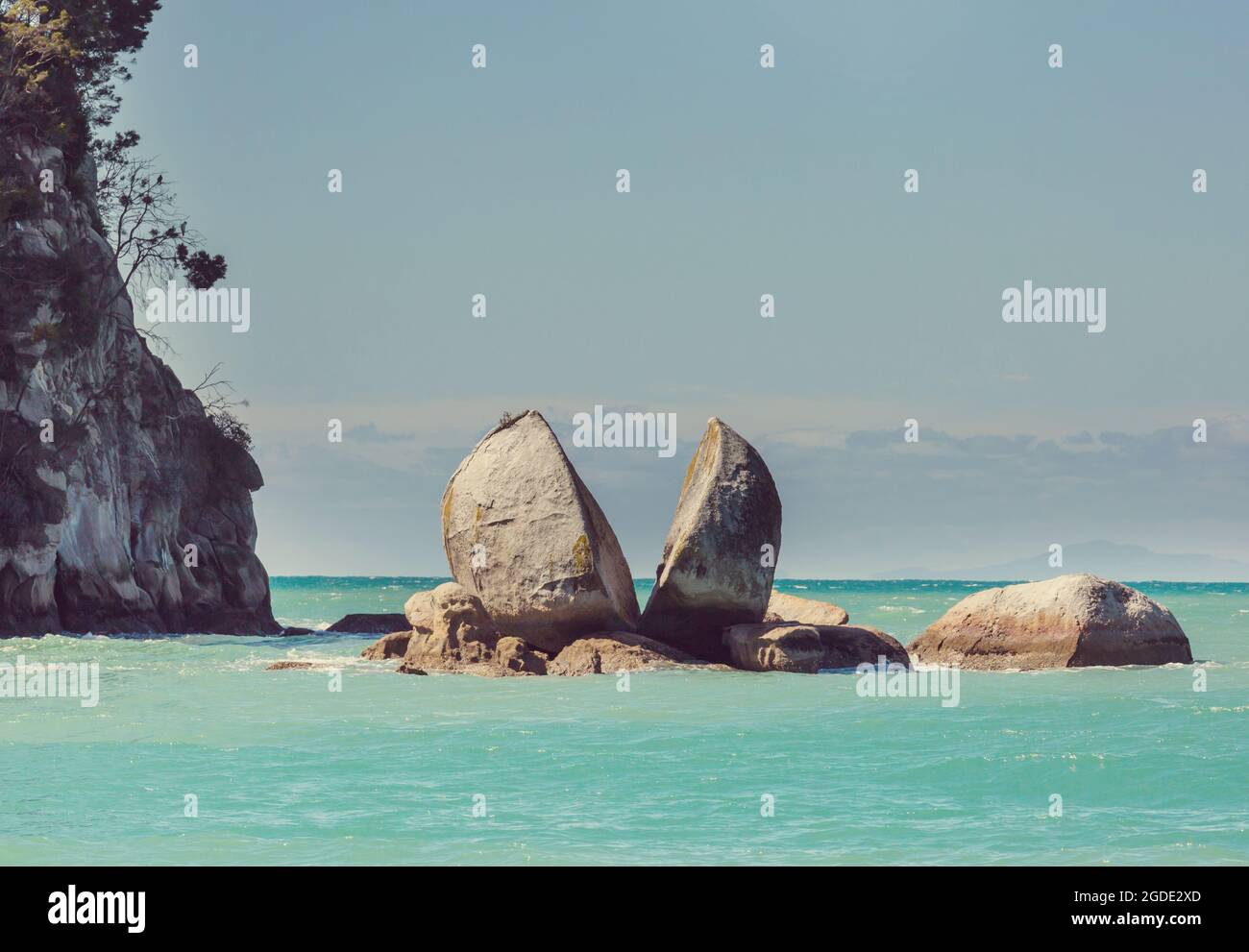 Split apple rock beach hi-res stock photography and images - Alamy