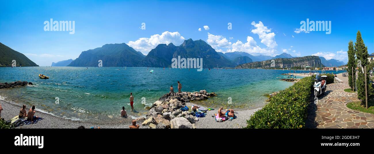 a panoramic view of Lake Garda in the most beautiful summer weather ...