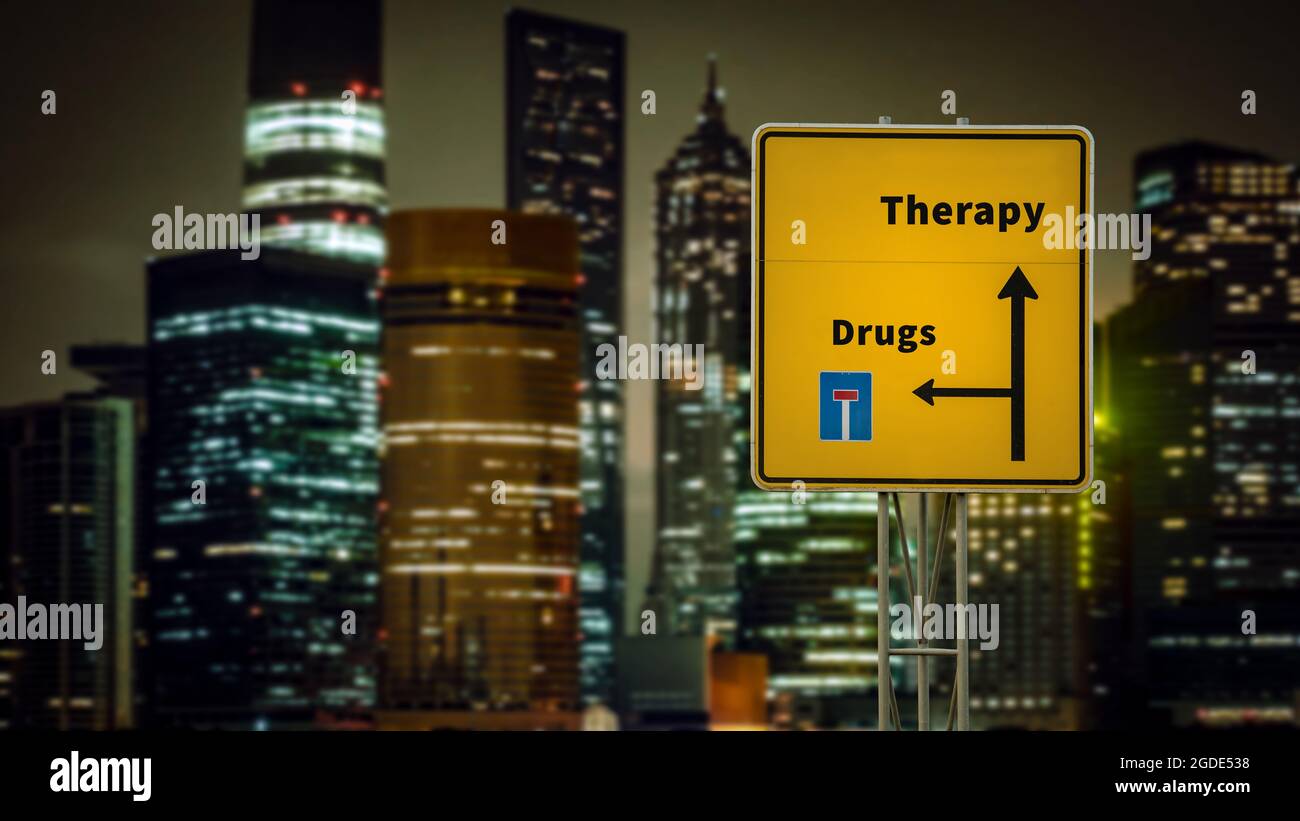 Street Sign the Direction Way to Therapy versus Drugs Stock Photo - Alamy