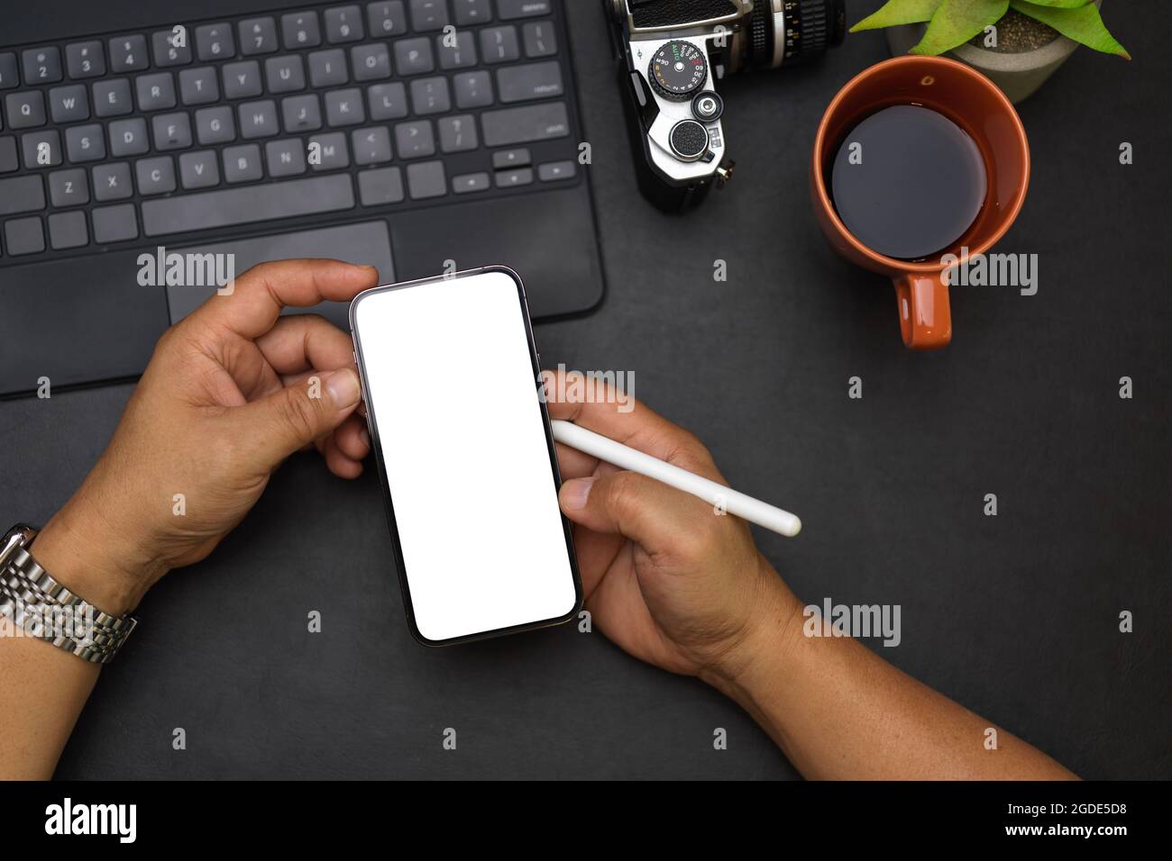 Close up, overhead male hands, reading news on the internet via ...