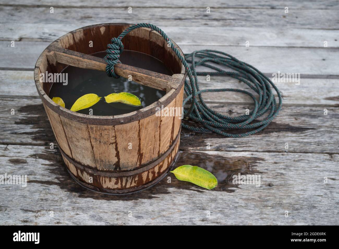 water in cask and rope Stock Photo - Alamy
