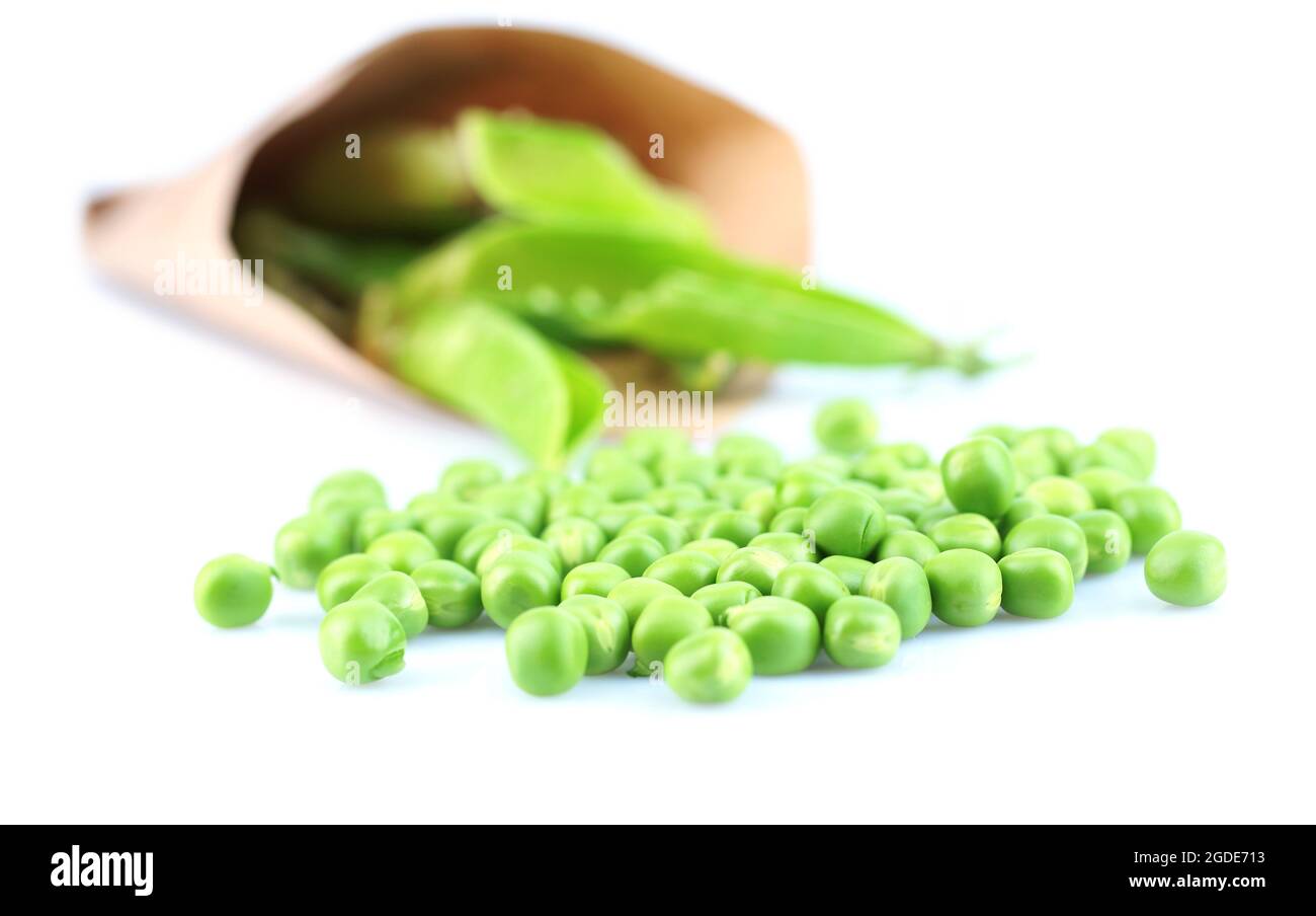 Fresh green peas in paper cone isolated on white background Stock Photo ...