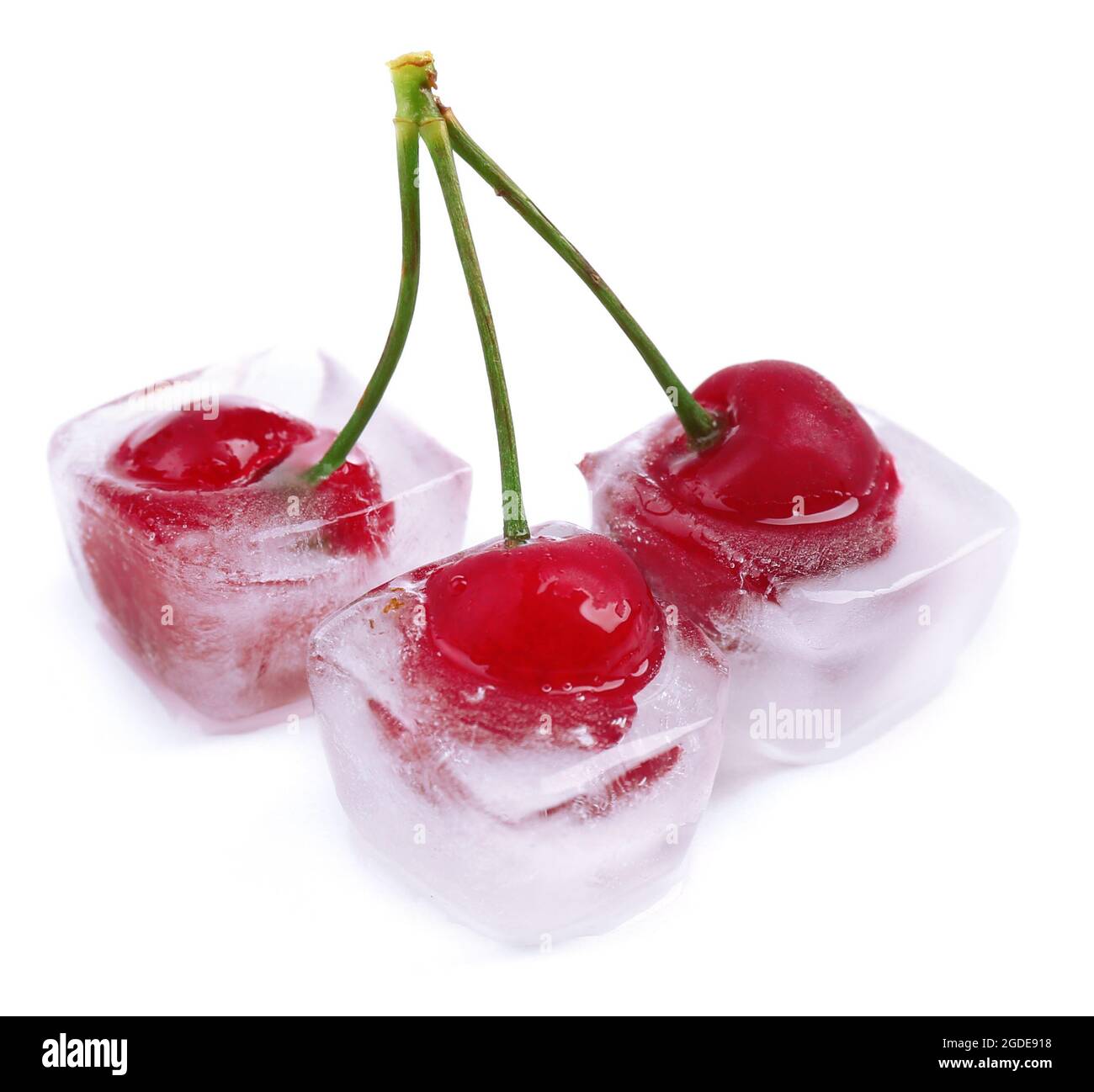 Cherry in ice cube isolated on white Stock Photo - Alamy