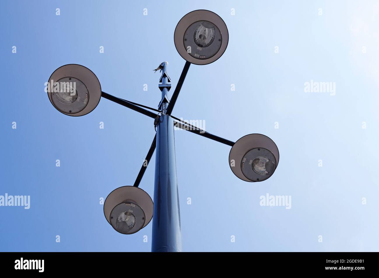 street lighting with four lamps in a cross Stock Photo - Alamy