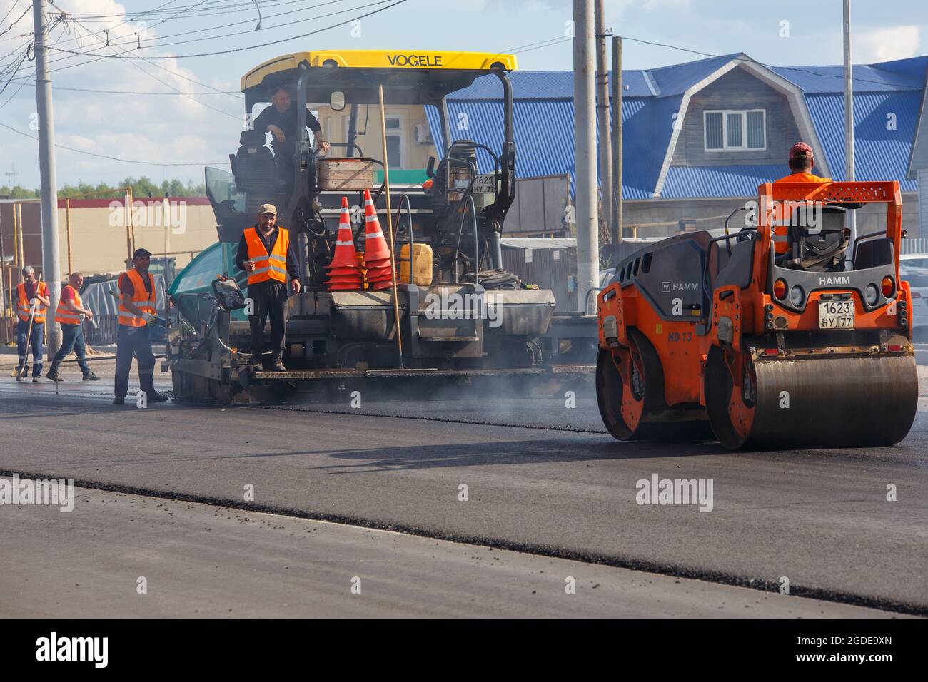 Tula, Russia - May 16, 2021: Process of asphalting, asphalt paver ...