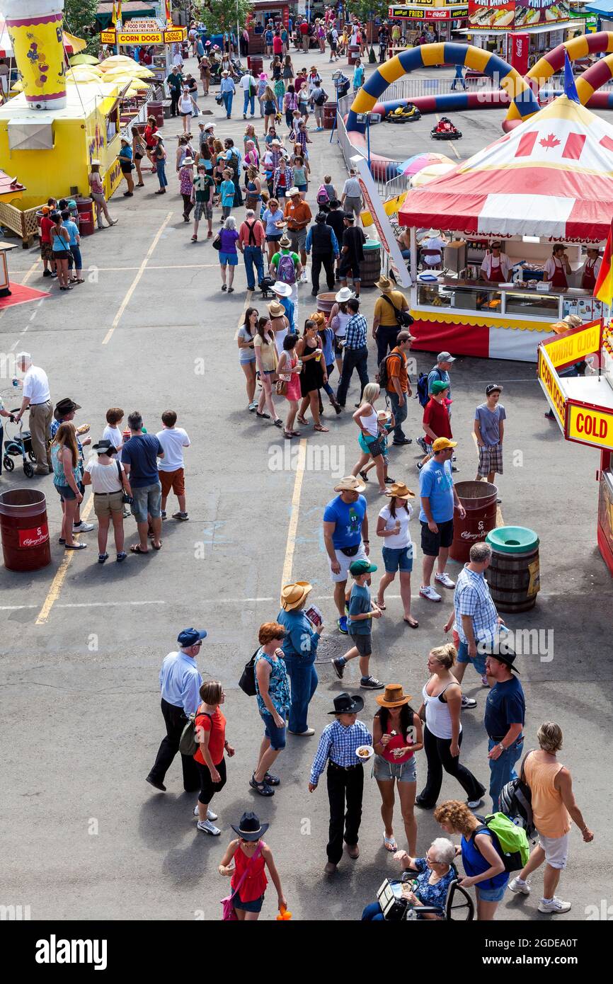 View of people at the fair grounds of the Calgary Stampede event ...