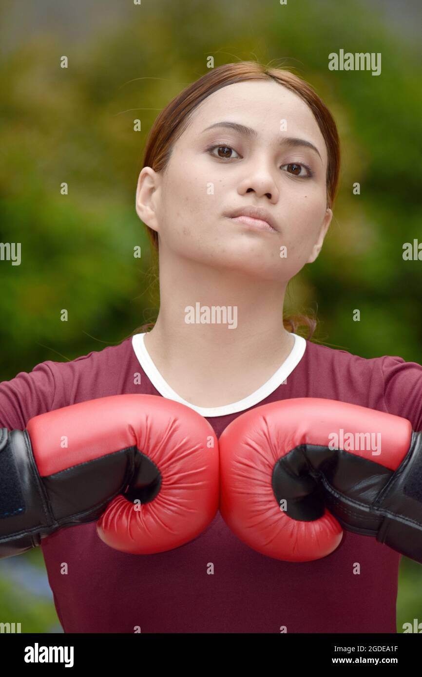 Serious Sporty Minority Female Athlete Wearing Boxing Gloves Stock ...