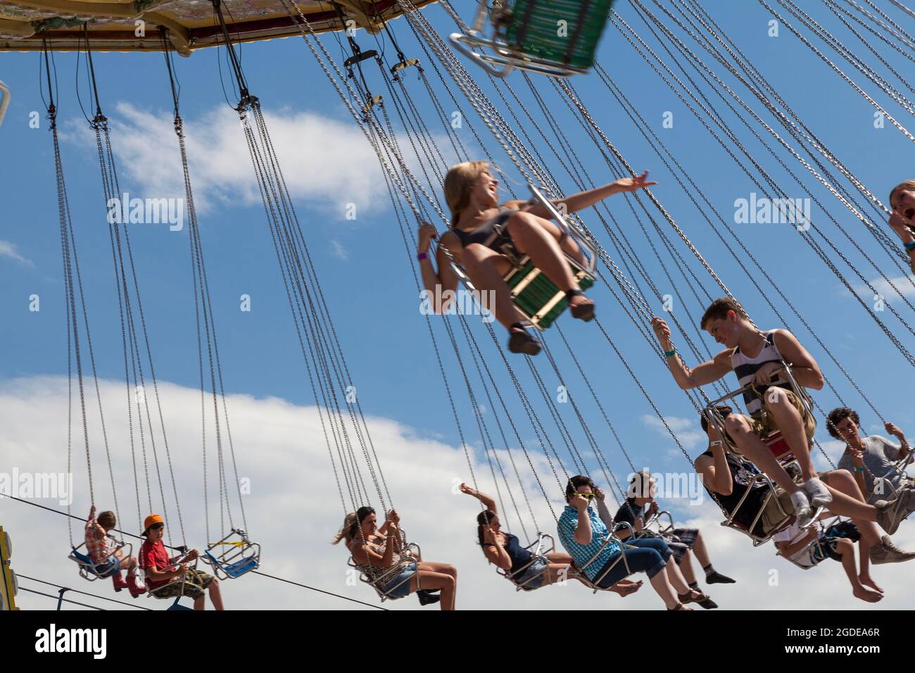 Blur view of people enjoying carnival rides at the Calgary stampede ...