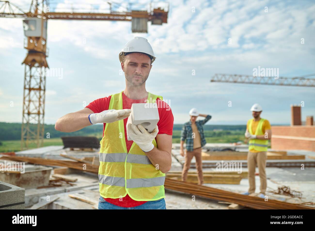 Experienced construction worker in gloves hi-res stock photography and ...