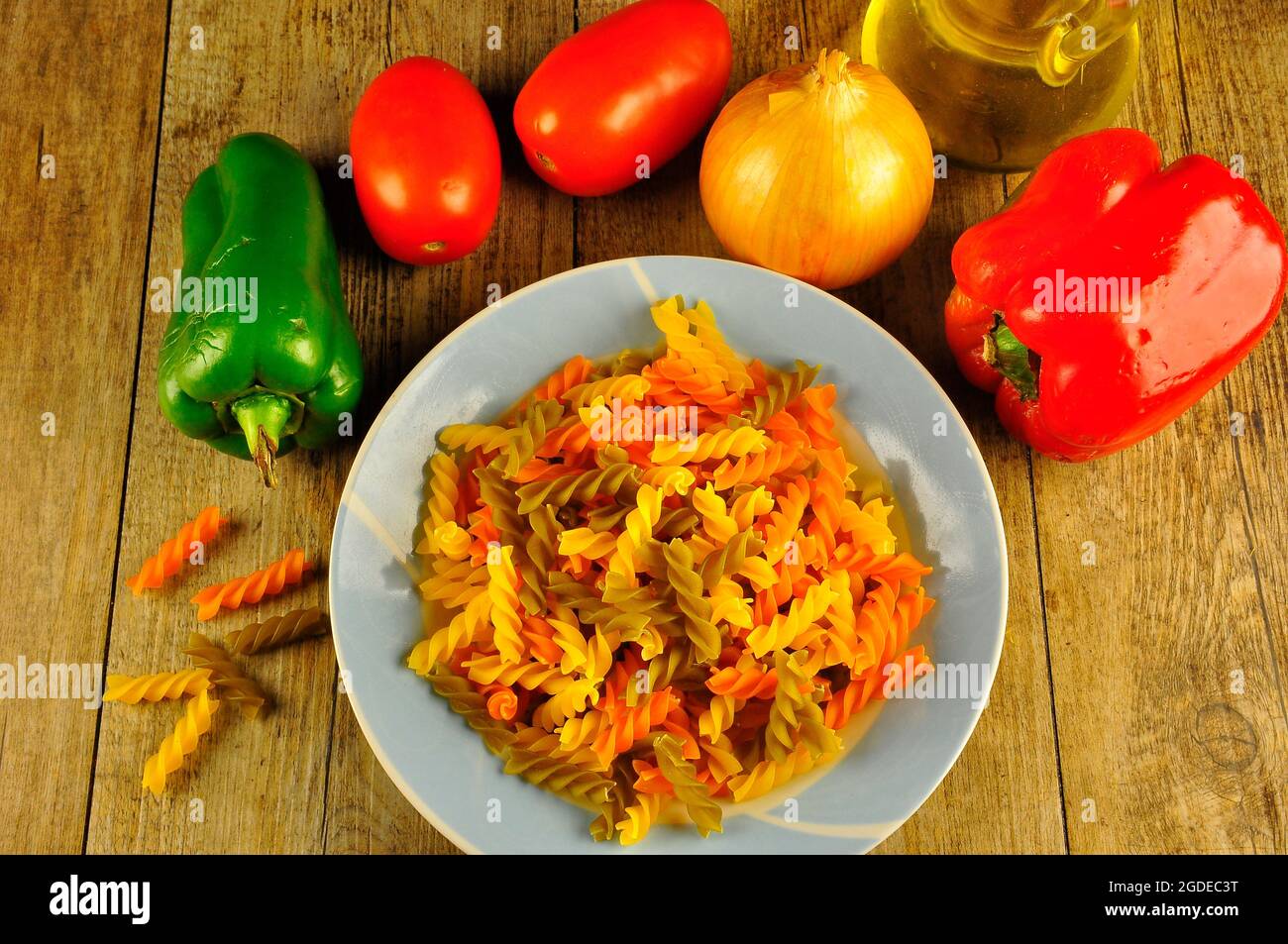 Pasta on the plate, ready to cook italian food Stock Photo - Alamy